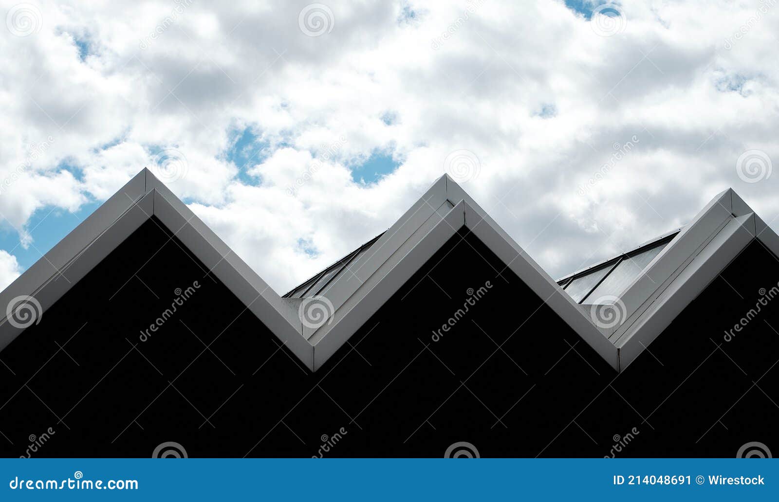 Three Roofs with Cloudy Sky in the Background Stock Image - Image of ...