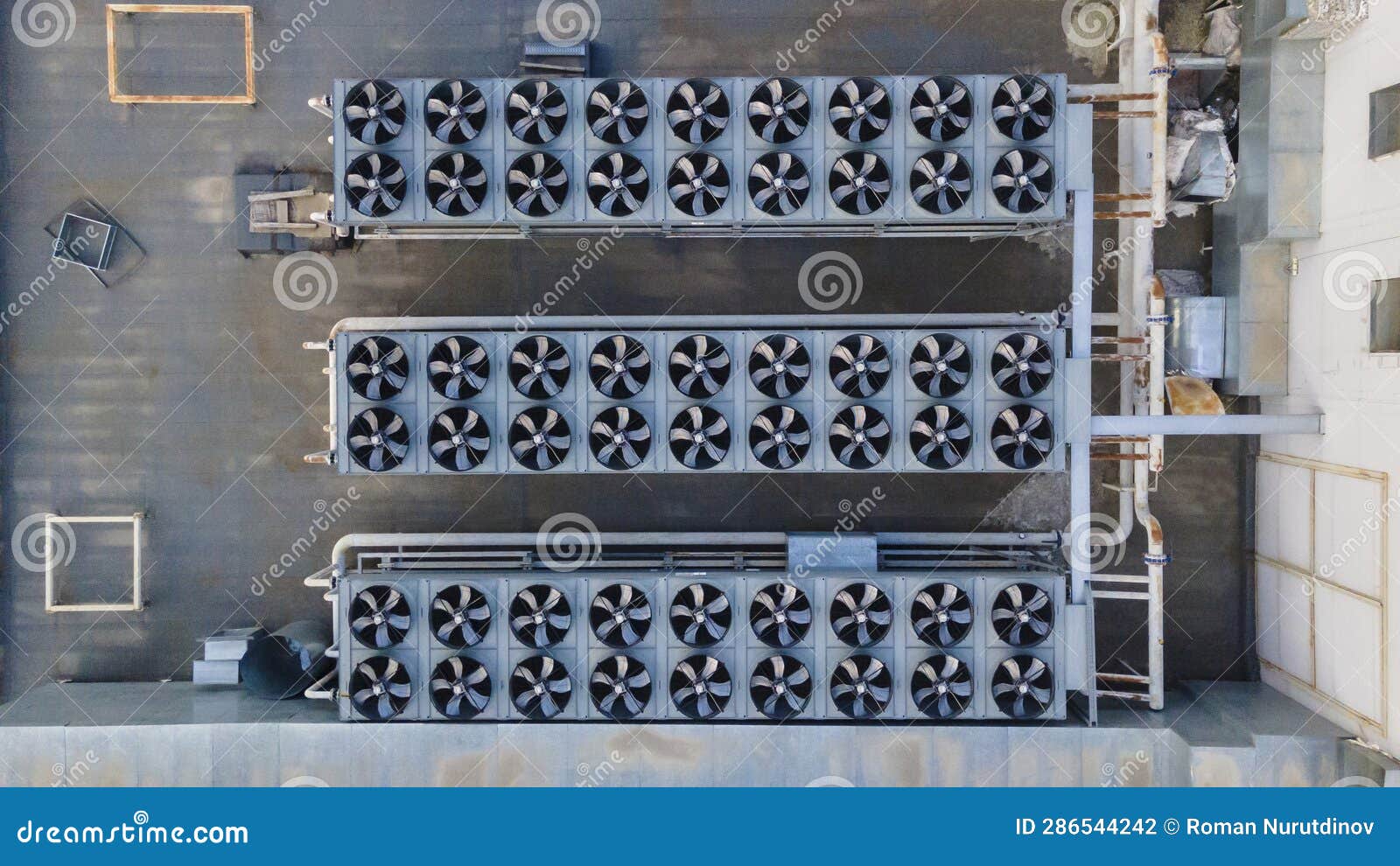 Three Rows of Fan Coils on the Roof of a Building Stock Photo - Image ...