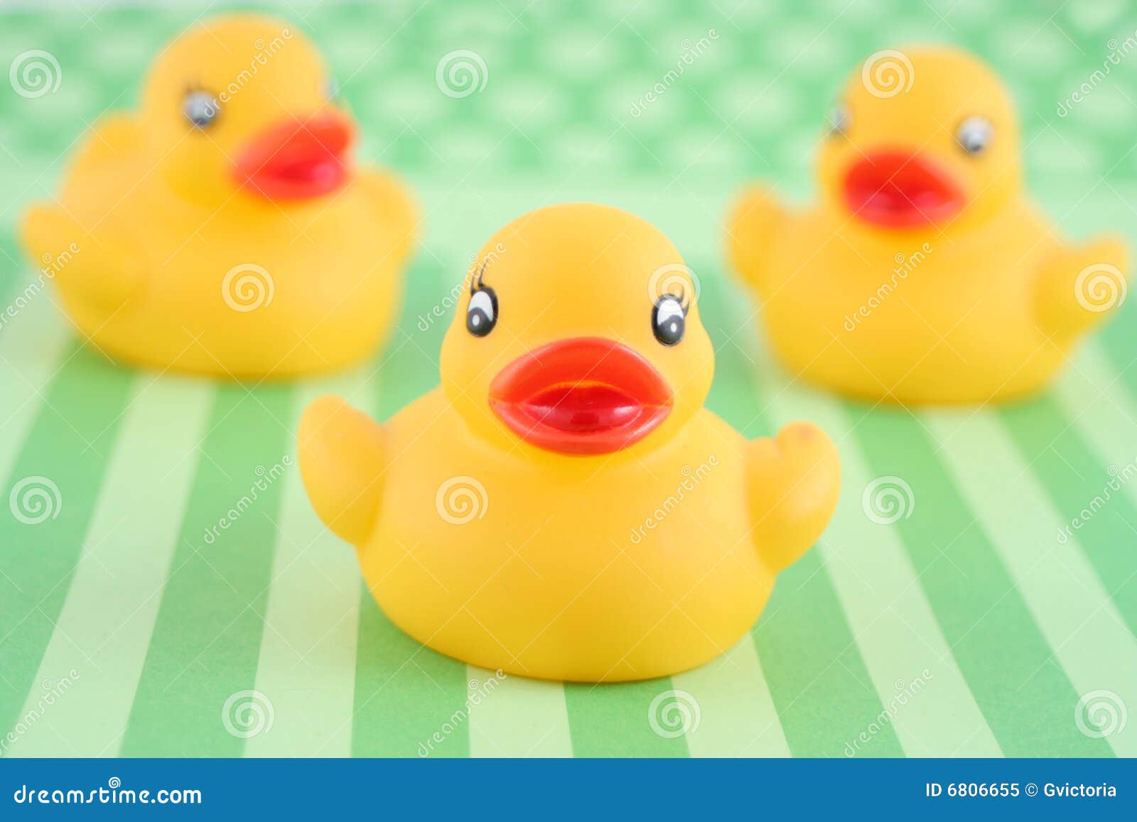 Three rubber duckies stock image. Image of ducks, duckies - 6806655