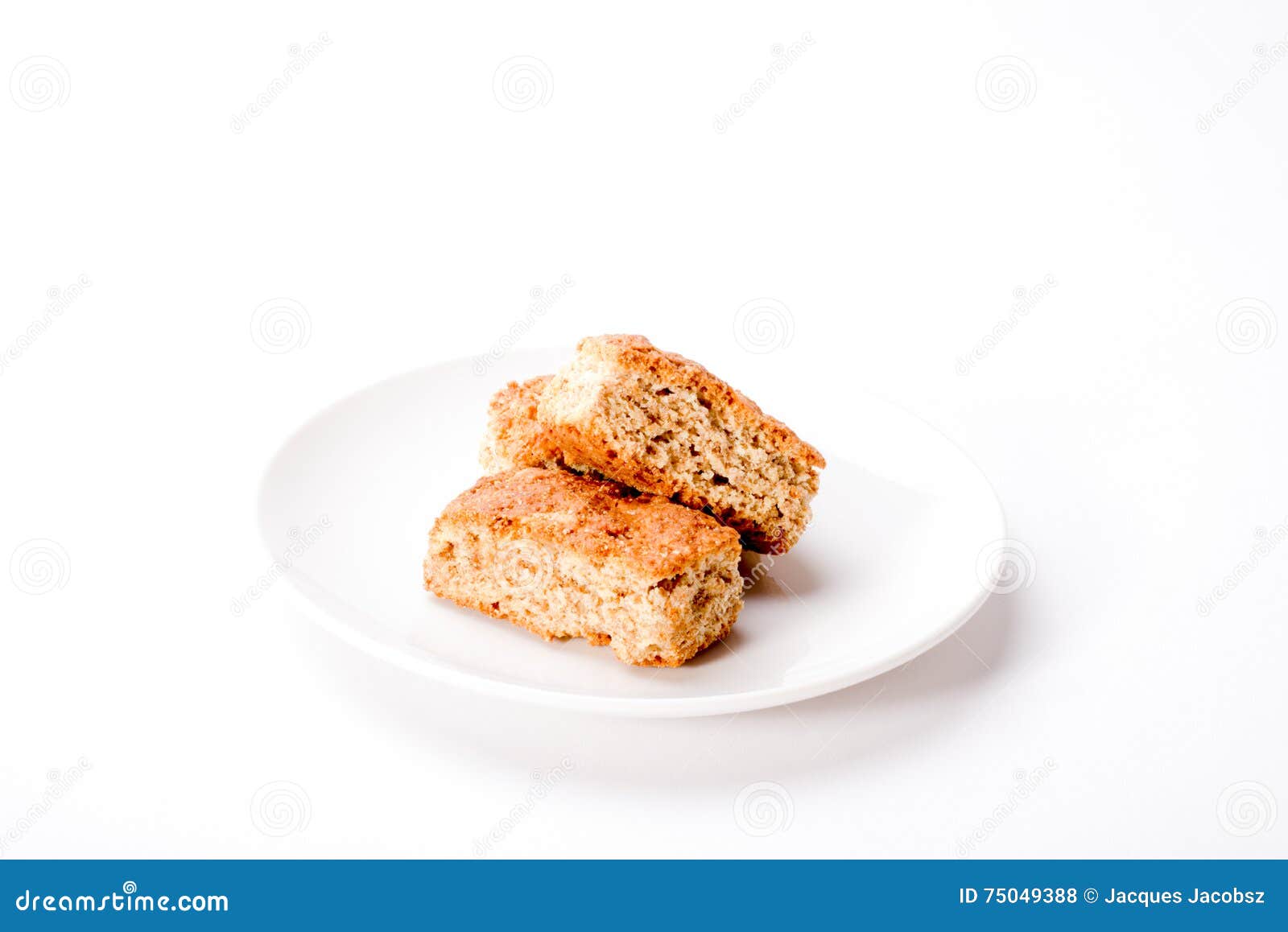 Three rusks on plate stock photo. Image of treat, hunger - 75049388