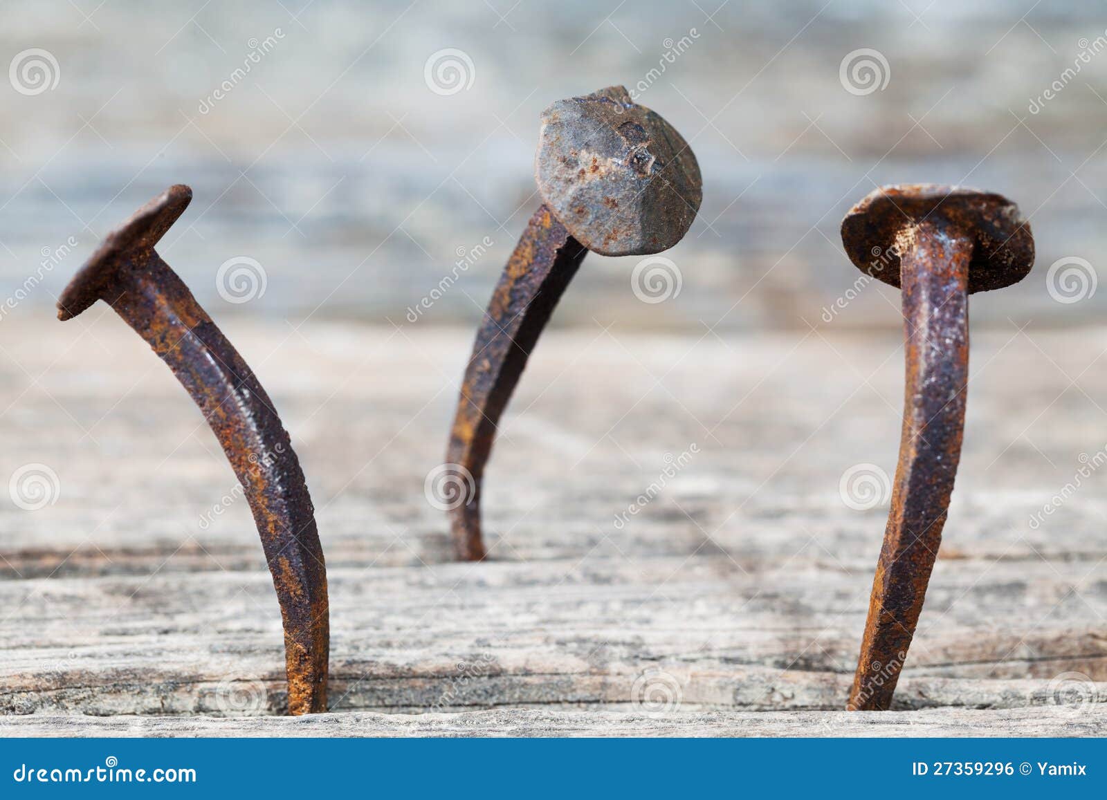 Three rusty nails stock photo. Image of wrought, color - 27359296