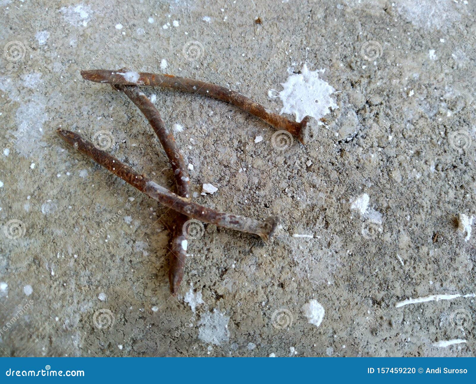 Three Rusty Nails on the Ground Stock Photo - Image of three, tool ...
