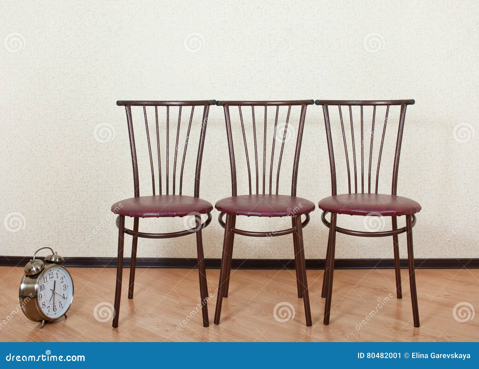 Three of the Same Chair Against the Wall Stock Image - Image of three ...