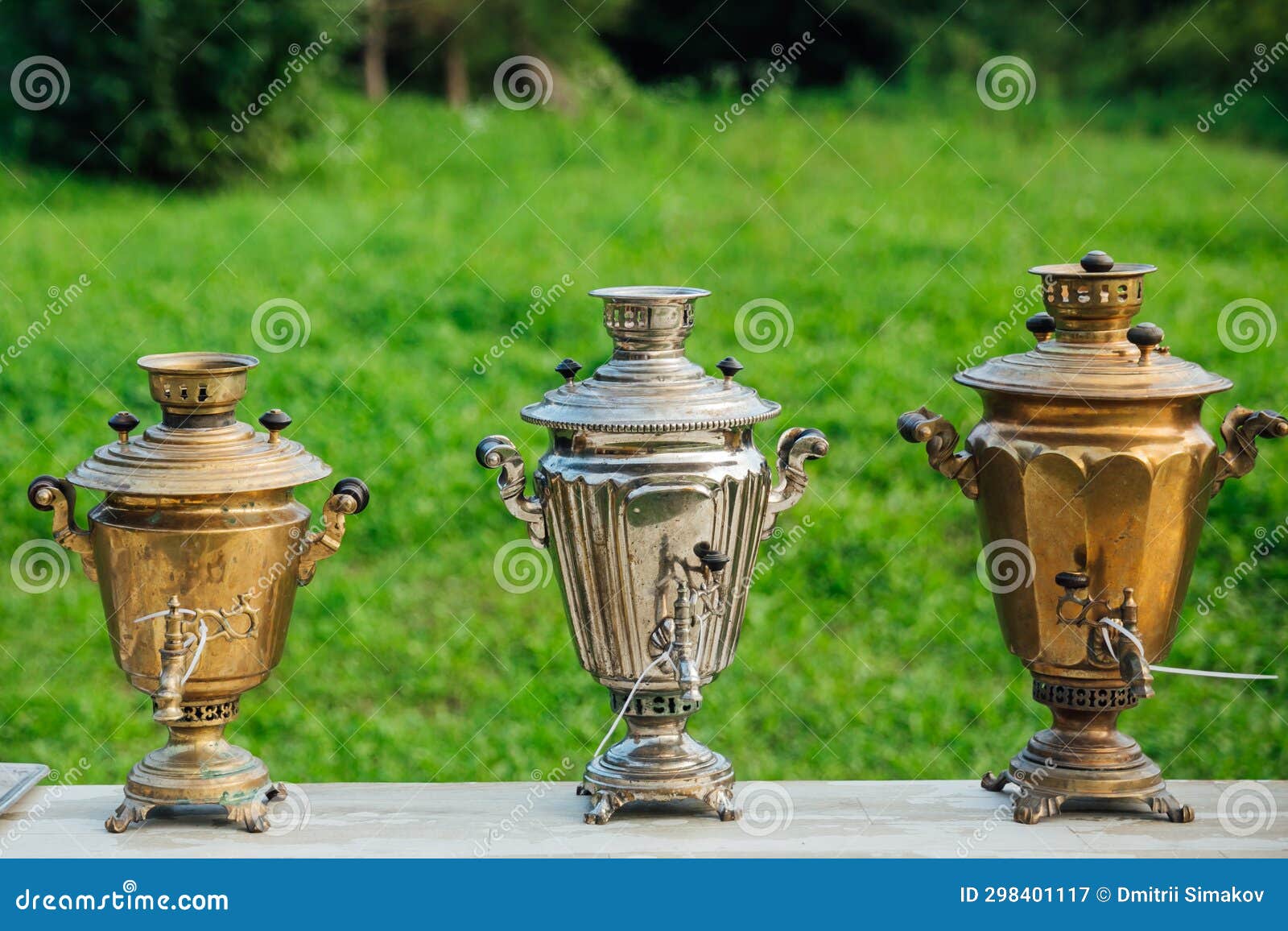 Three Samovars on the Background of Green Grass Stock Image - Image of ...