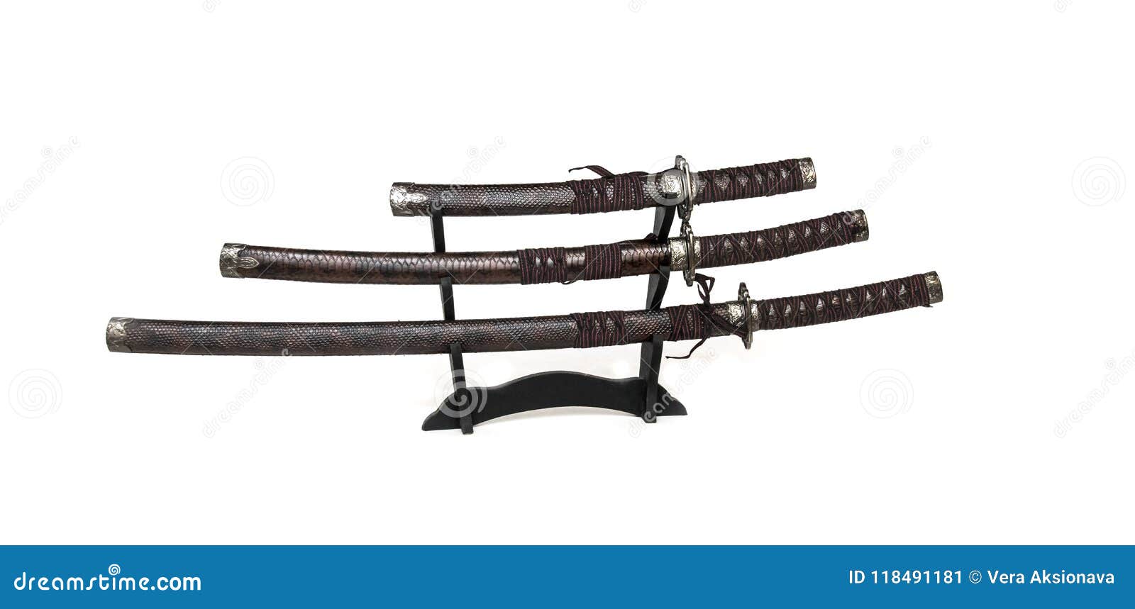 Three Samurai Swords Hang On Wall Next To Table Royalty-Free Stock ...