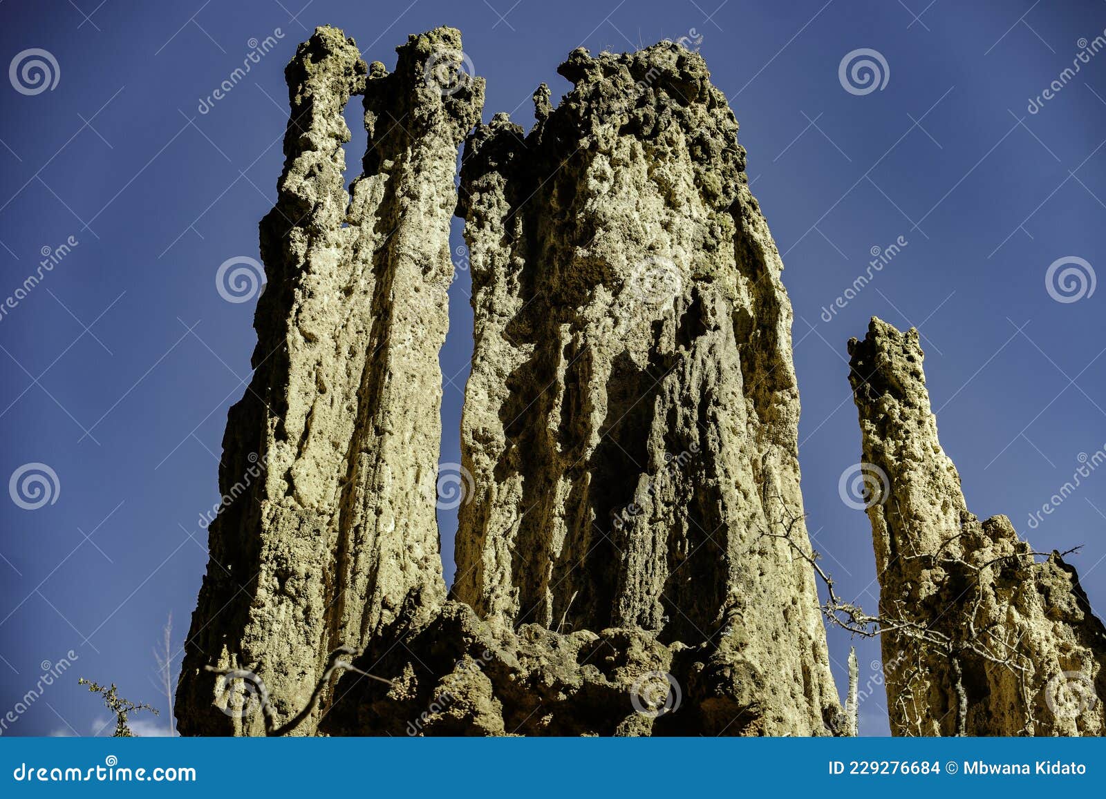 Three Sand Pillars Under Blue Sky Stock Photo - Image of stone ...
