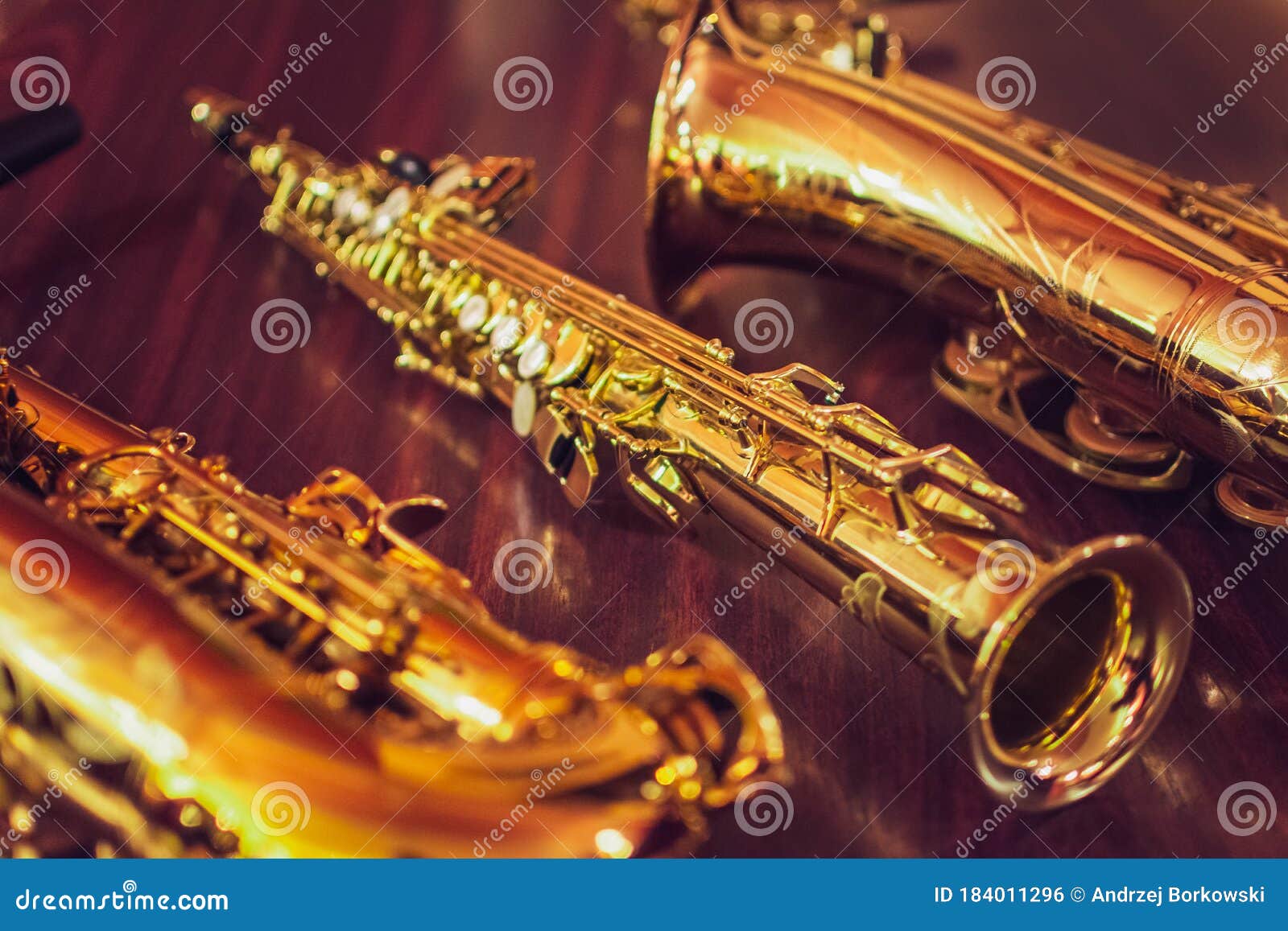 Three saxophones stock photo. Image of detailed, gold - 184011296