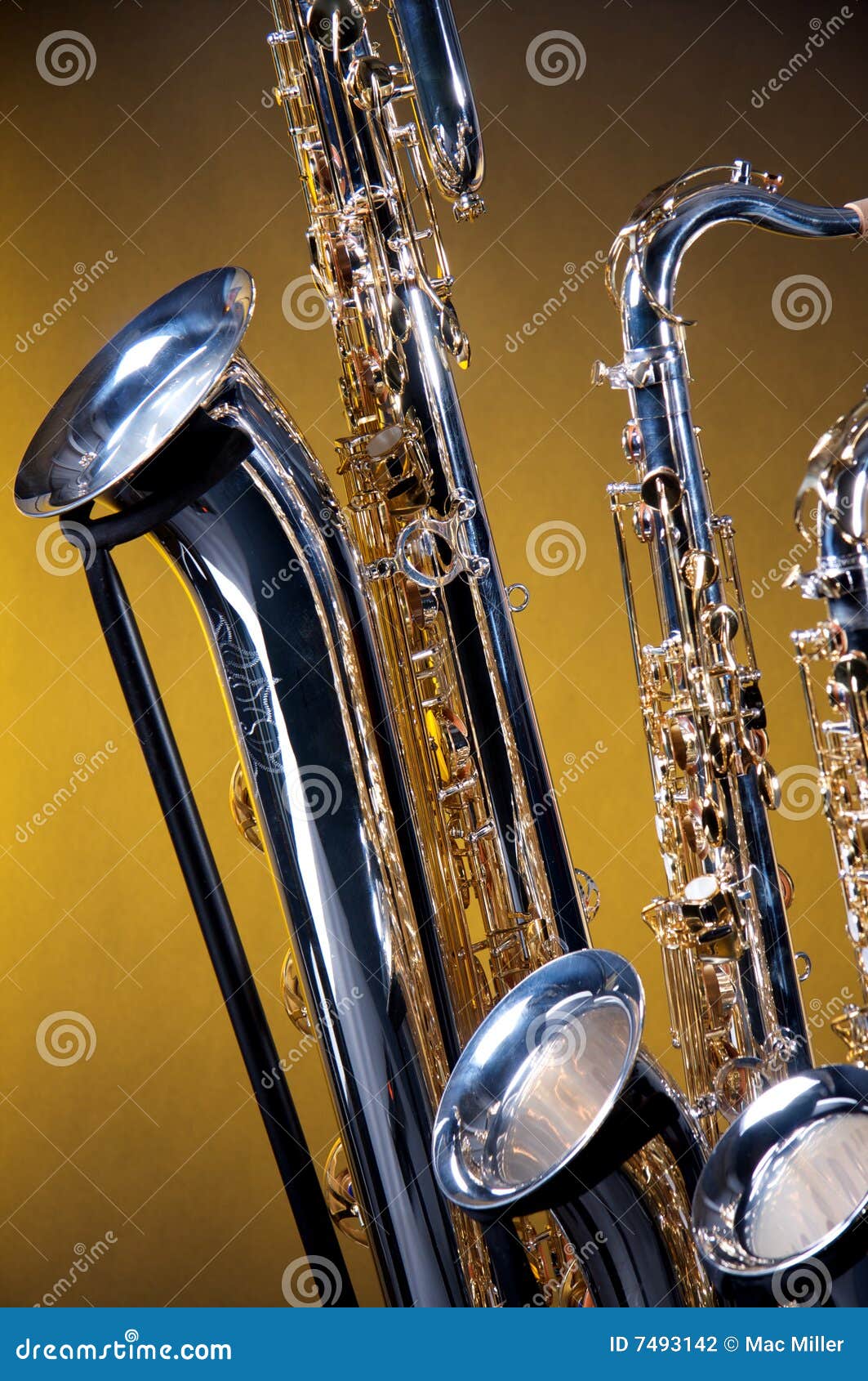 Three Saxophones on Yellow stock photo. Image of isolated - 7493142