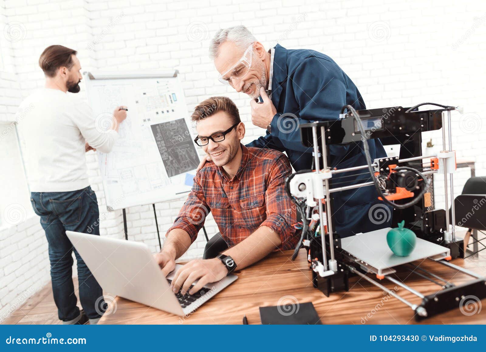 Three Scientists are Involved in Setting Up and Developing 3D Printers ...