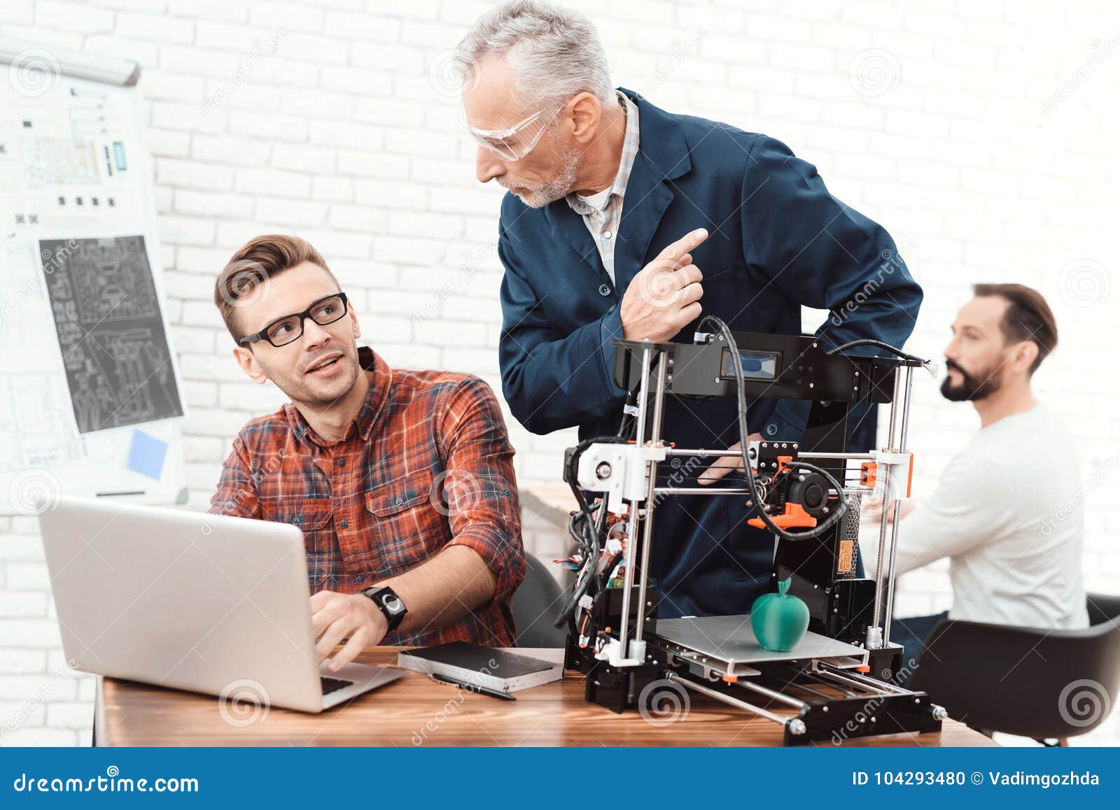 Three Scientists are Involved in Setting Up and Developing 3D Printers ...