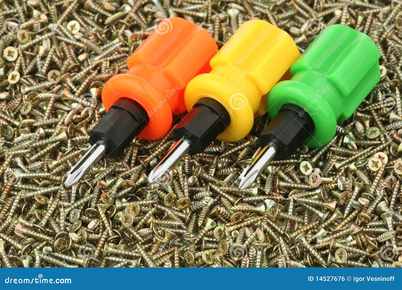 Three screw-drivers stock photo. Image of groove, metal - 14527676