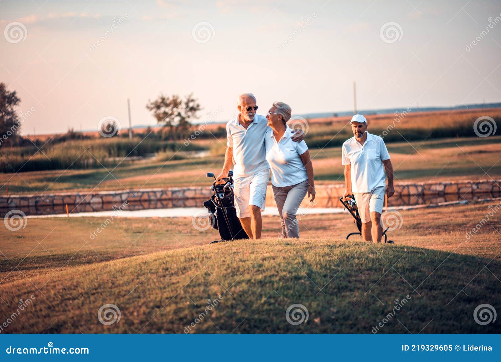 Seniors Golfers Having Fun on Golf Field Stock Image - Image of ...