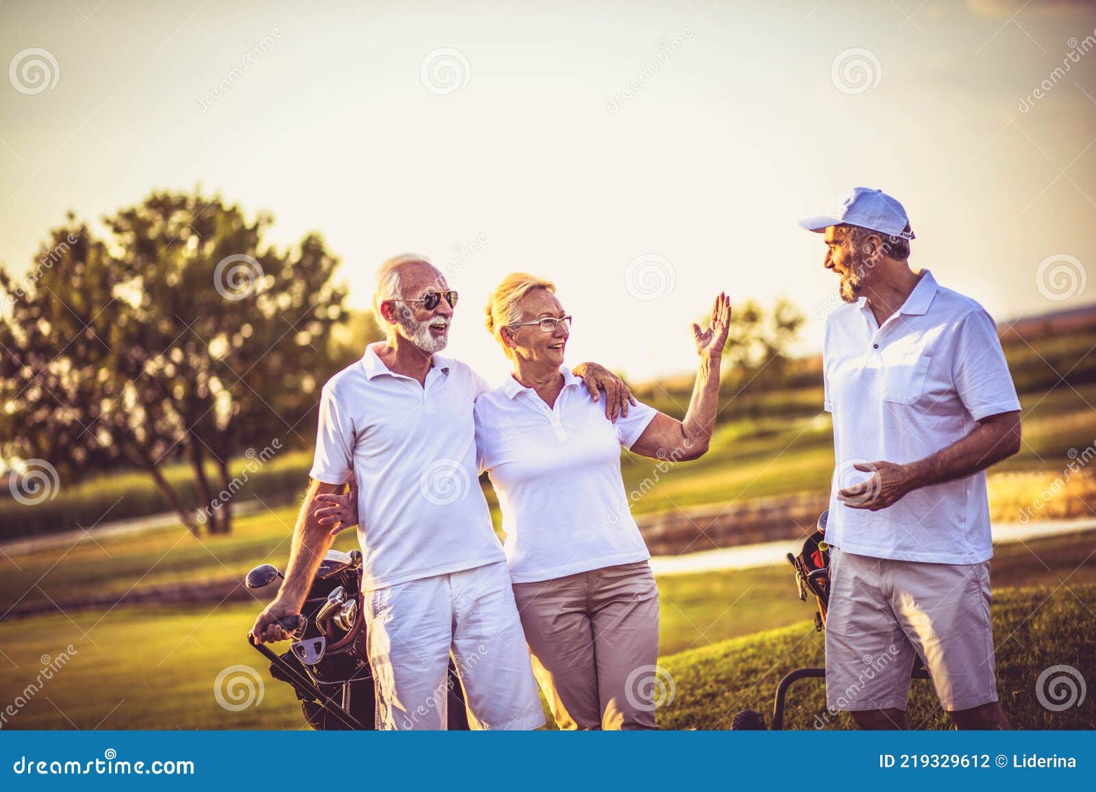 Seniors Golfers Having Fun on Golf Field Stock Photo - Image of ...