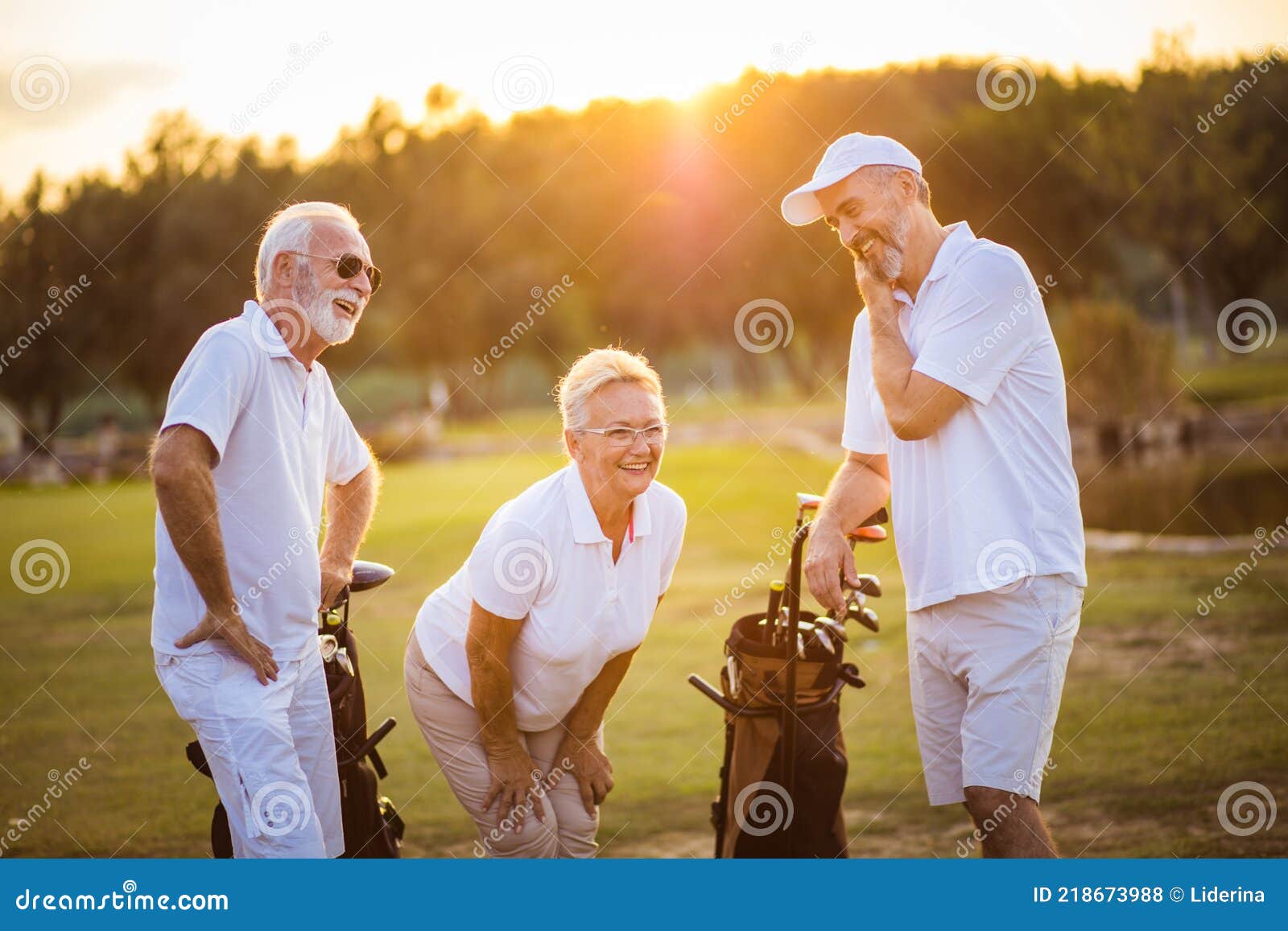 Seniors Golfers Talking on Golf Field Stock Photo - Image of healthy ...