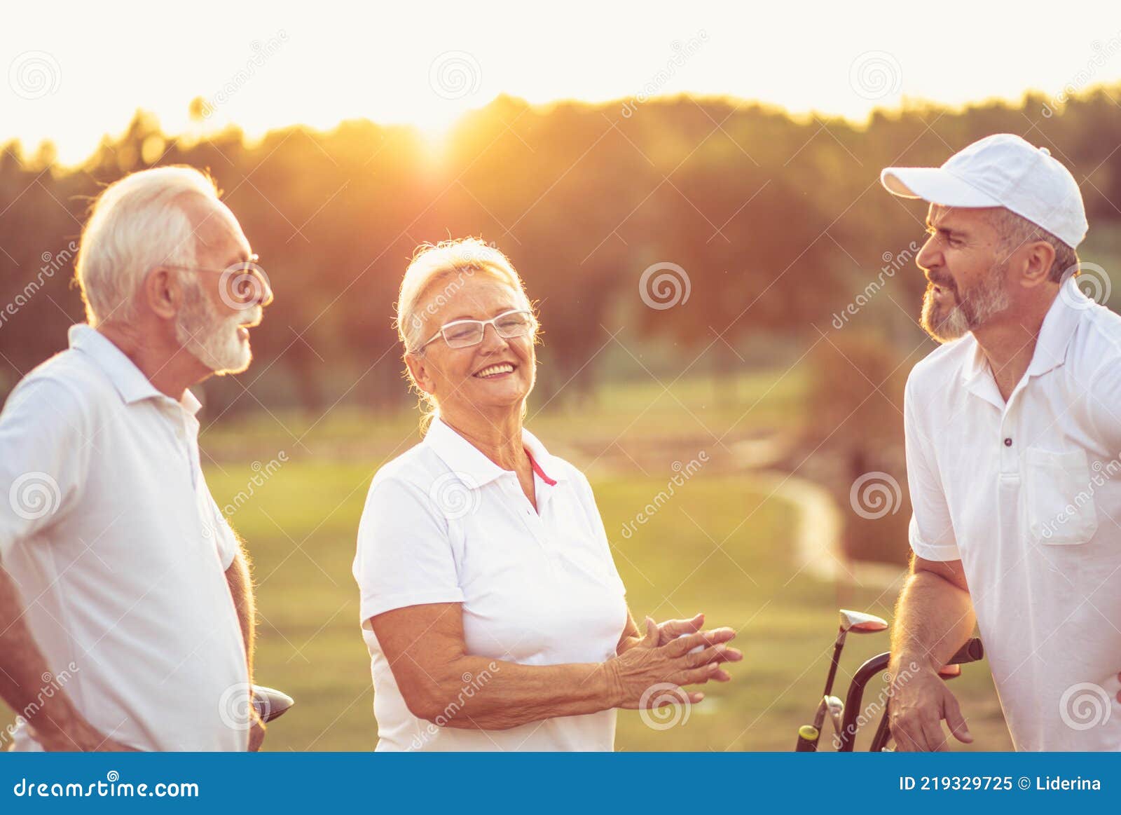 Seniors Golfers Talking on Golf Field Stock Image - Image of golf ...