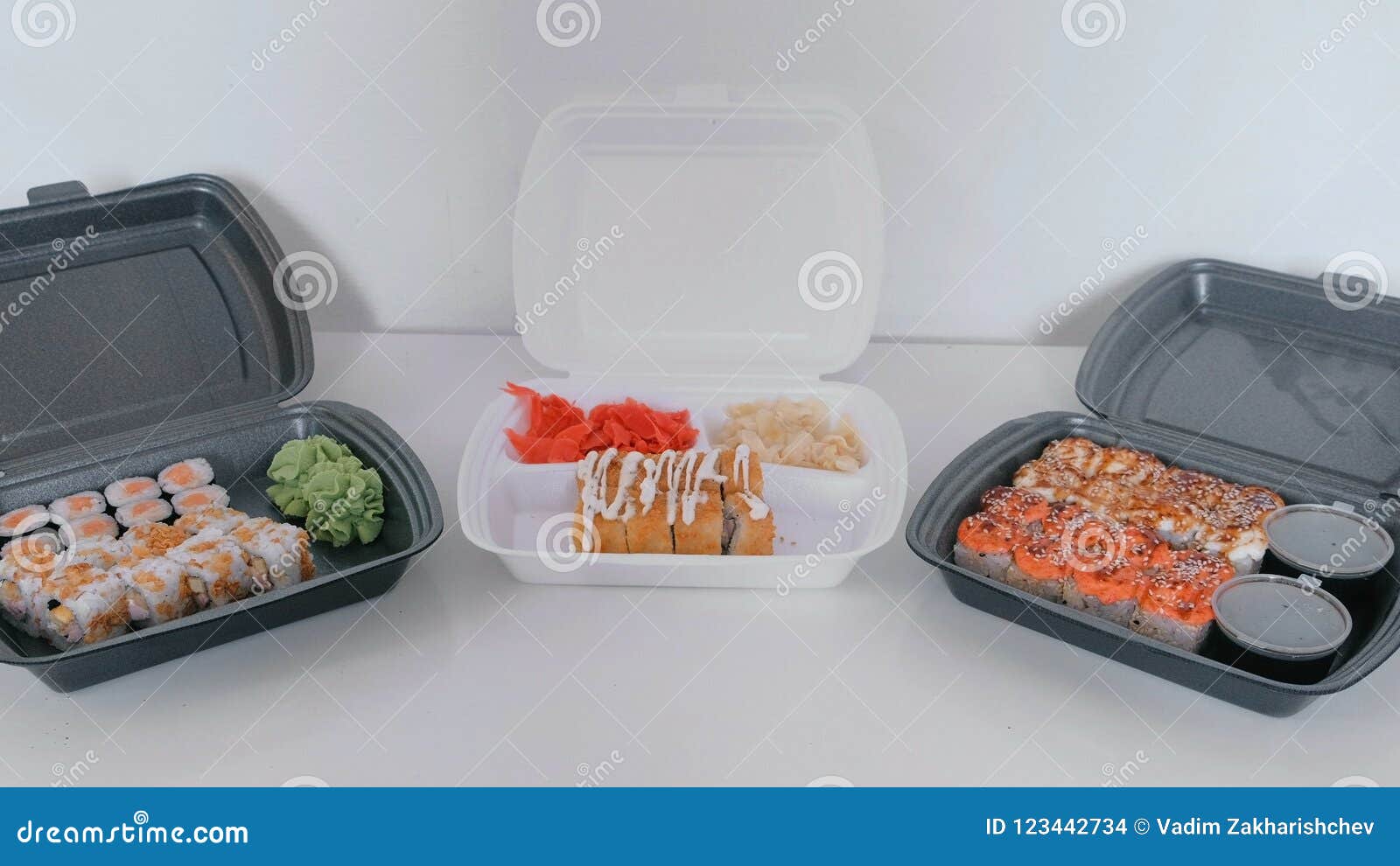 Three Sets of Rolls in Plastic Packaging on the Kitchen Table. Stock ...