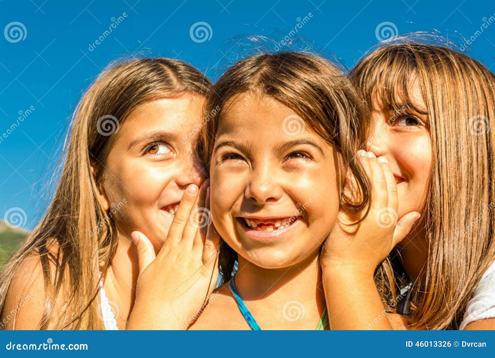 Three Seven Year Old Girls Playing and Whispering Stock Photo - Image ...