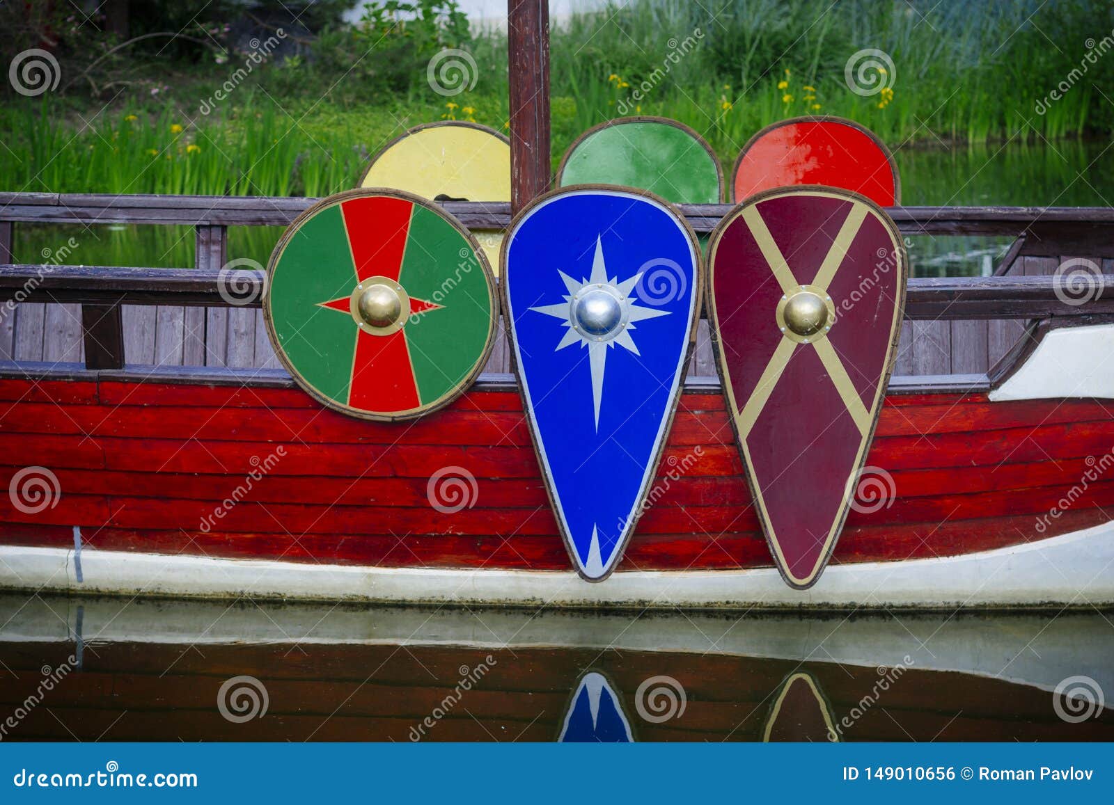 Three Shields on the Old Boat Stock Photo - Image of painted, terem ...