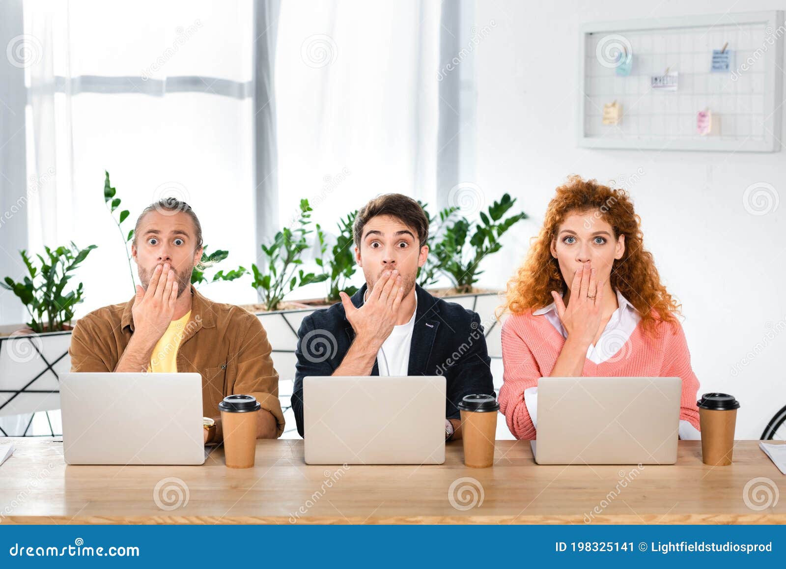 Three Shocked Friends Sitting at Table Stock Image - Image of european ...