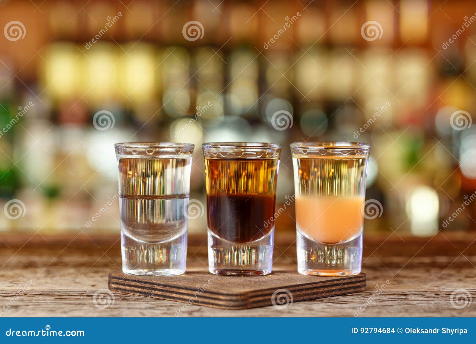 Three Shots Cocktail on the Bar Stock Photo - Image of orange, glass ...