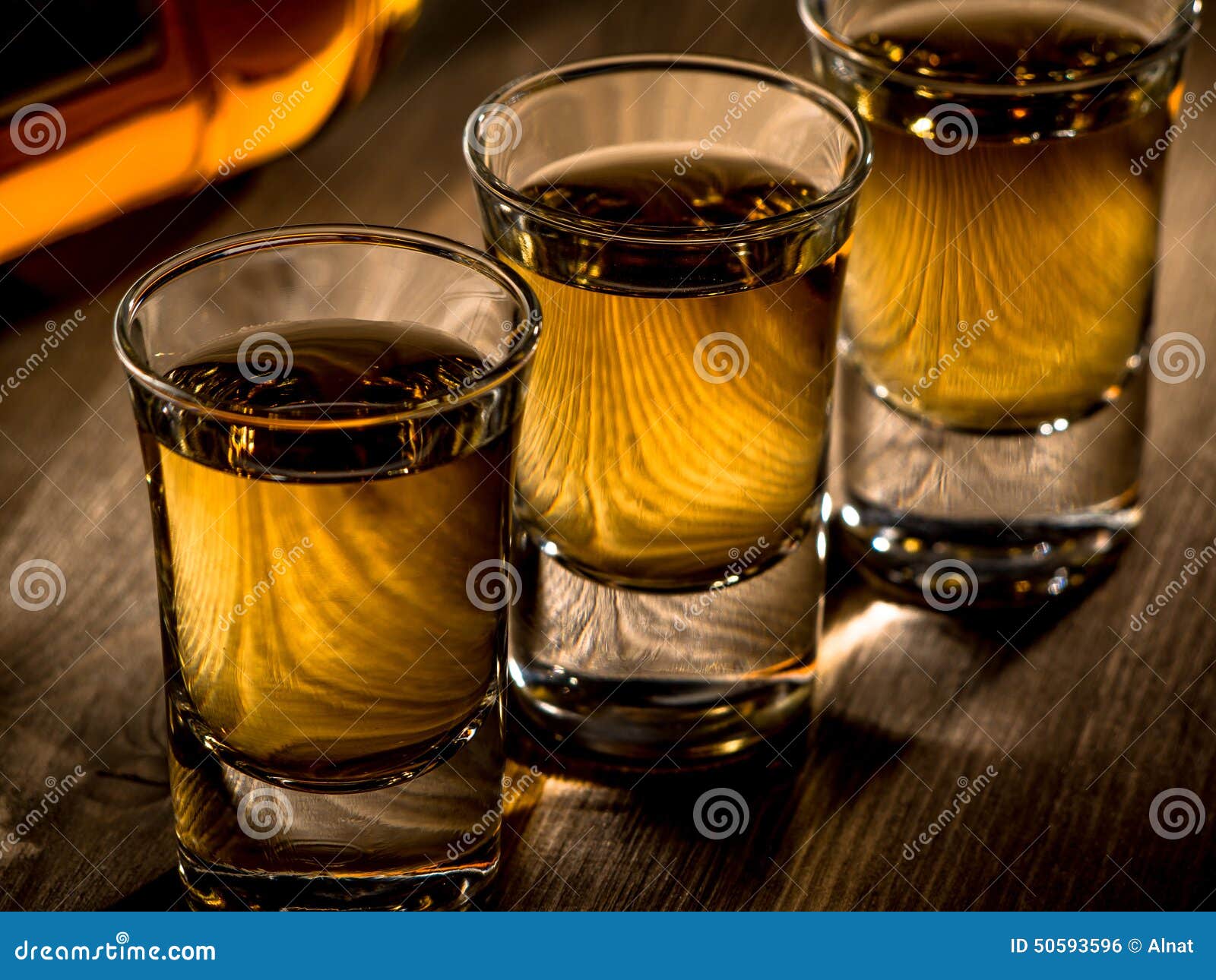 Three shots stock photo. Image of spirit, liquor, wood - 50593596