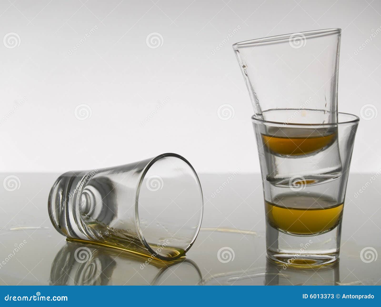 Three shots of whisky stock image. Image of whiskey, gold - 6013373