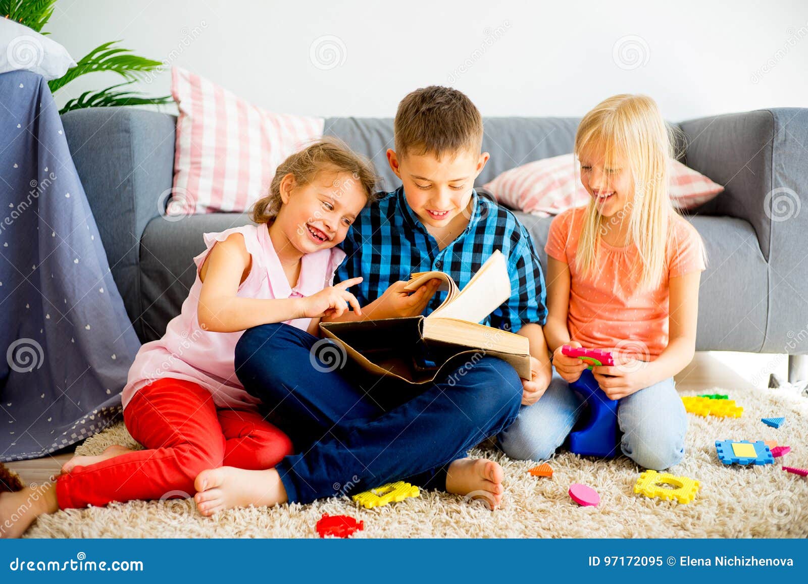 Three Siblings Reading a Book Stock Image - Image of pupil, information ...
