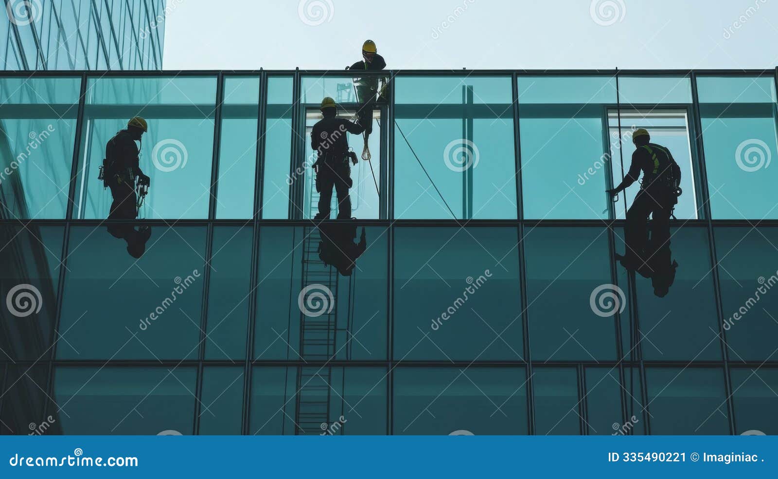 Window Washers Hanging From Ropes On A Modern Building Stock Photo ...