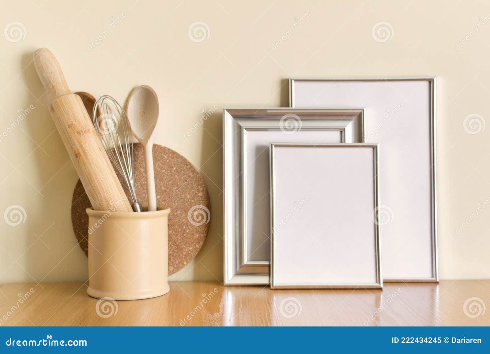 Three Silver Frames and Wooden Kitchen Utensils Stock Image - Image of ...