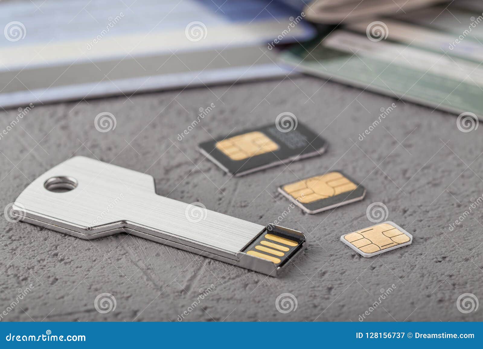 Three SIM Cards of Different Sizes Lie on a Rough Surface. Close-up ...