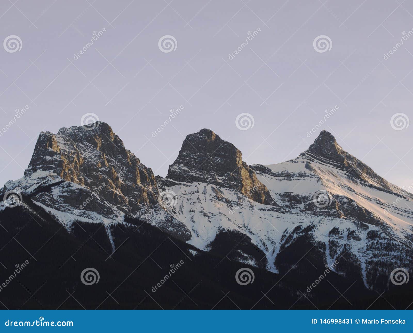 Three Sisters Mountain Range in Alberta Stock Image - Image of alberta ...
