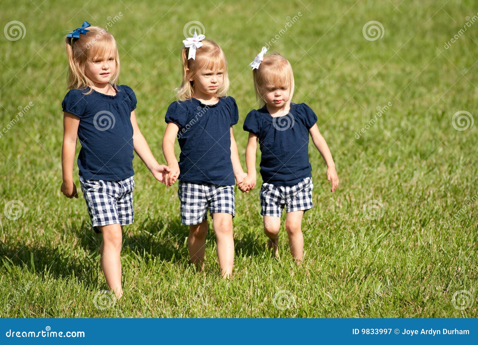 Three Sisters Holding Hands