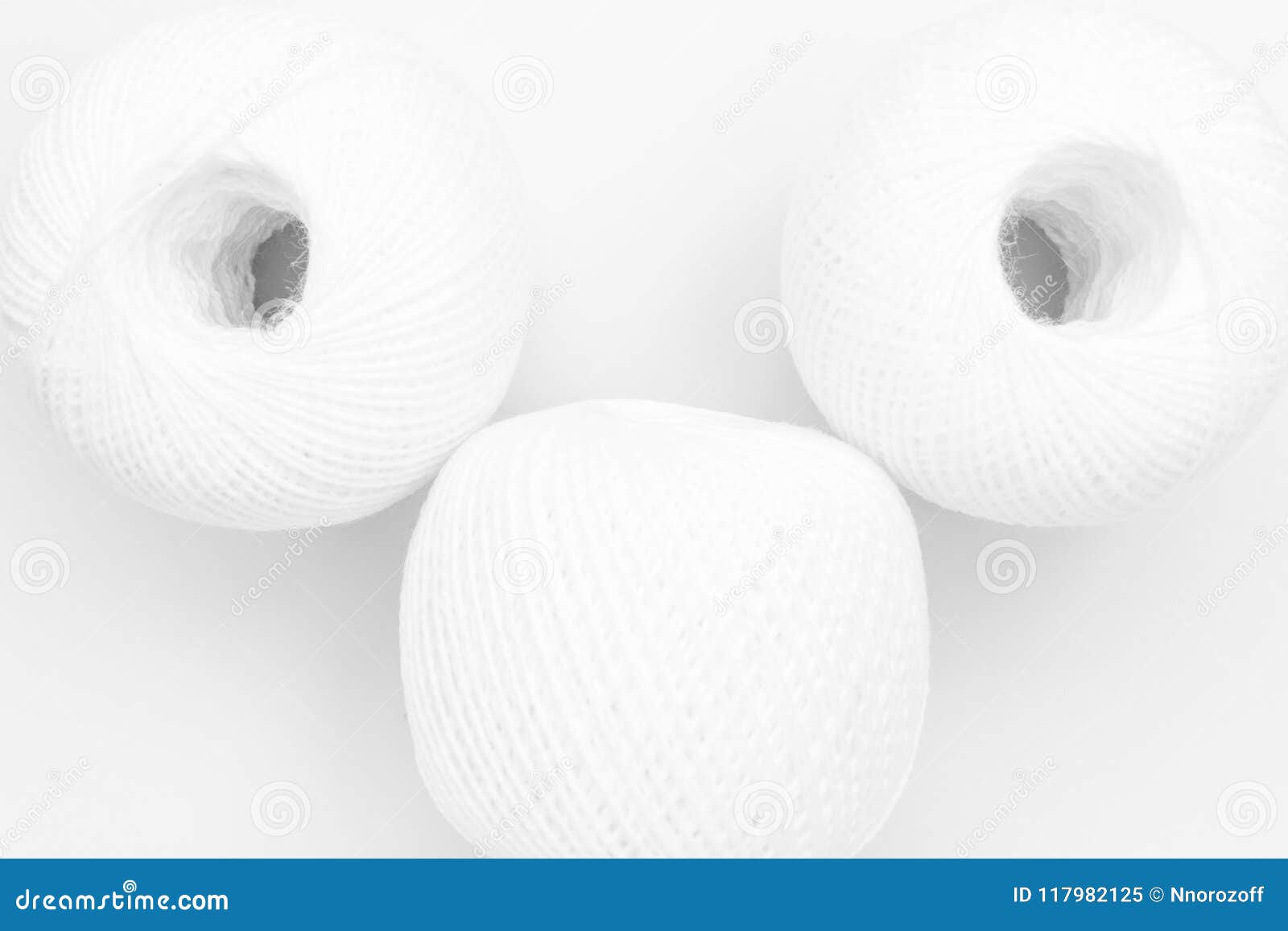 Three Skeins of White Thread on White Background, Abstract Background ...