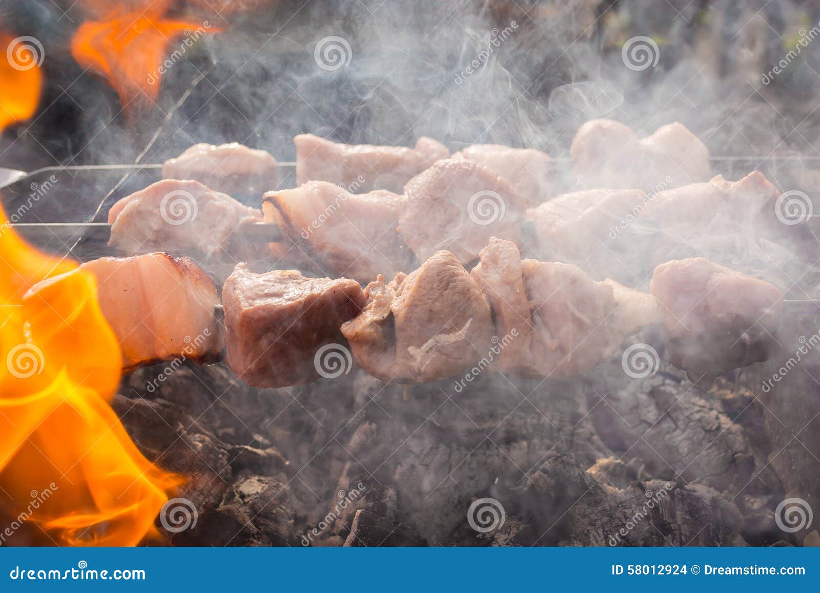 Three Skewers with Raw Meat in the Smoke of Fire Stock Photo - Image of ... Three Skewers with Raw Meat in the Smoke of Fire Stock Photo - Image of ...