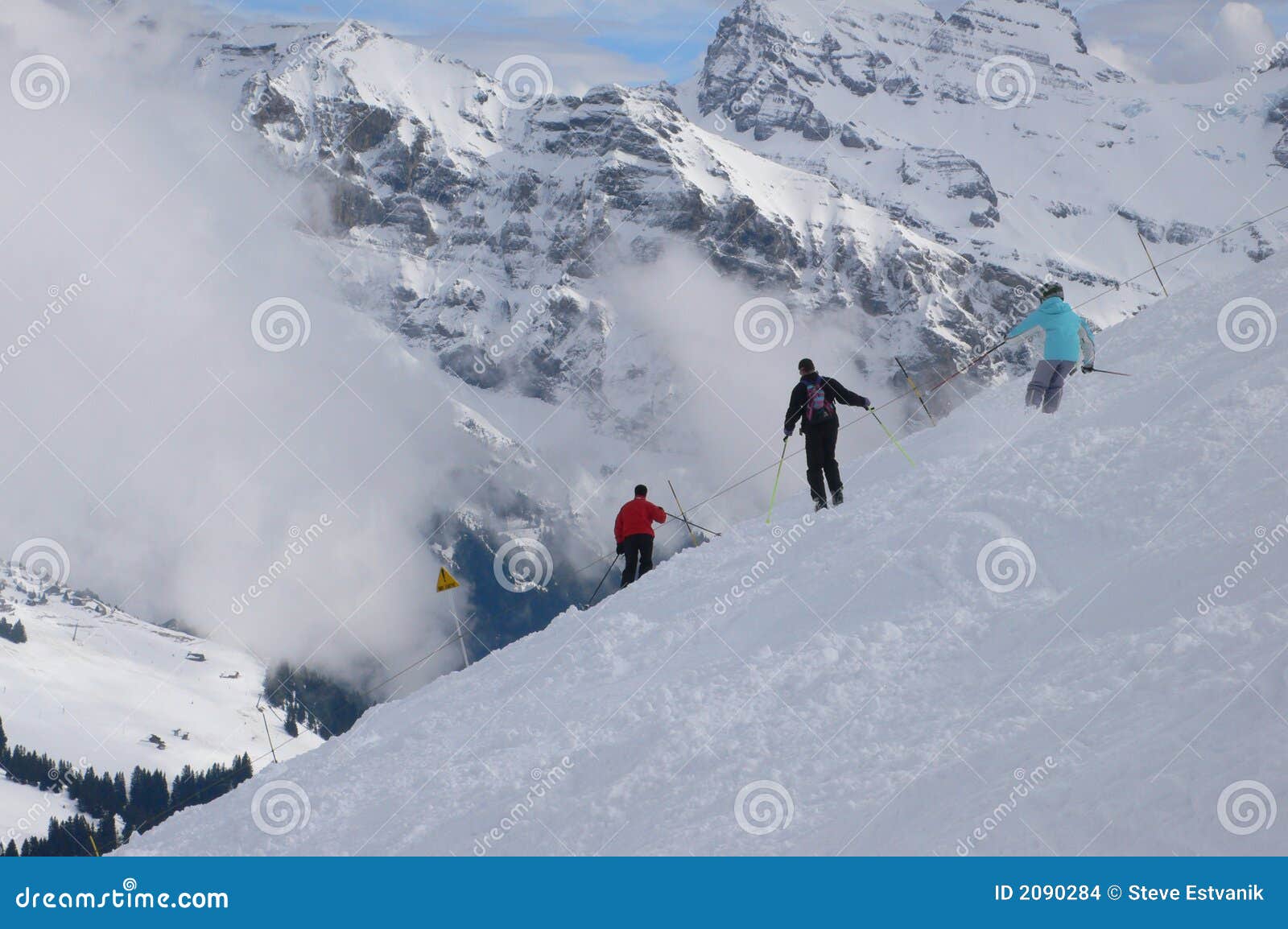 Three skiers traversing stock photo. Image of tracks, winter - 2090284