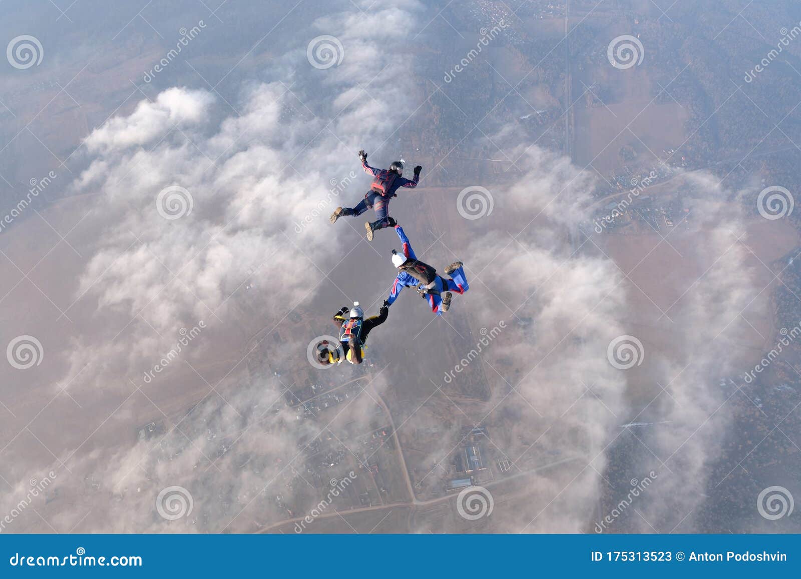 Formation Skydiving. Three Skydivers are in the Sky. Stock Image ...