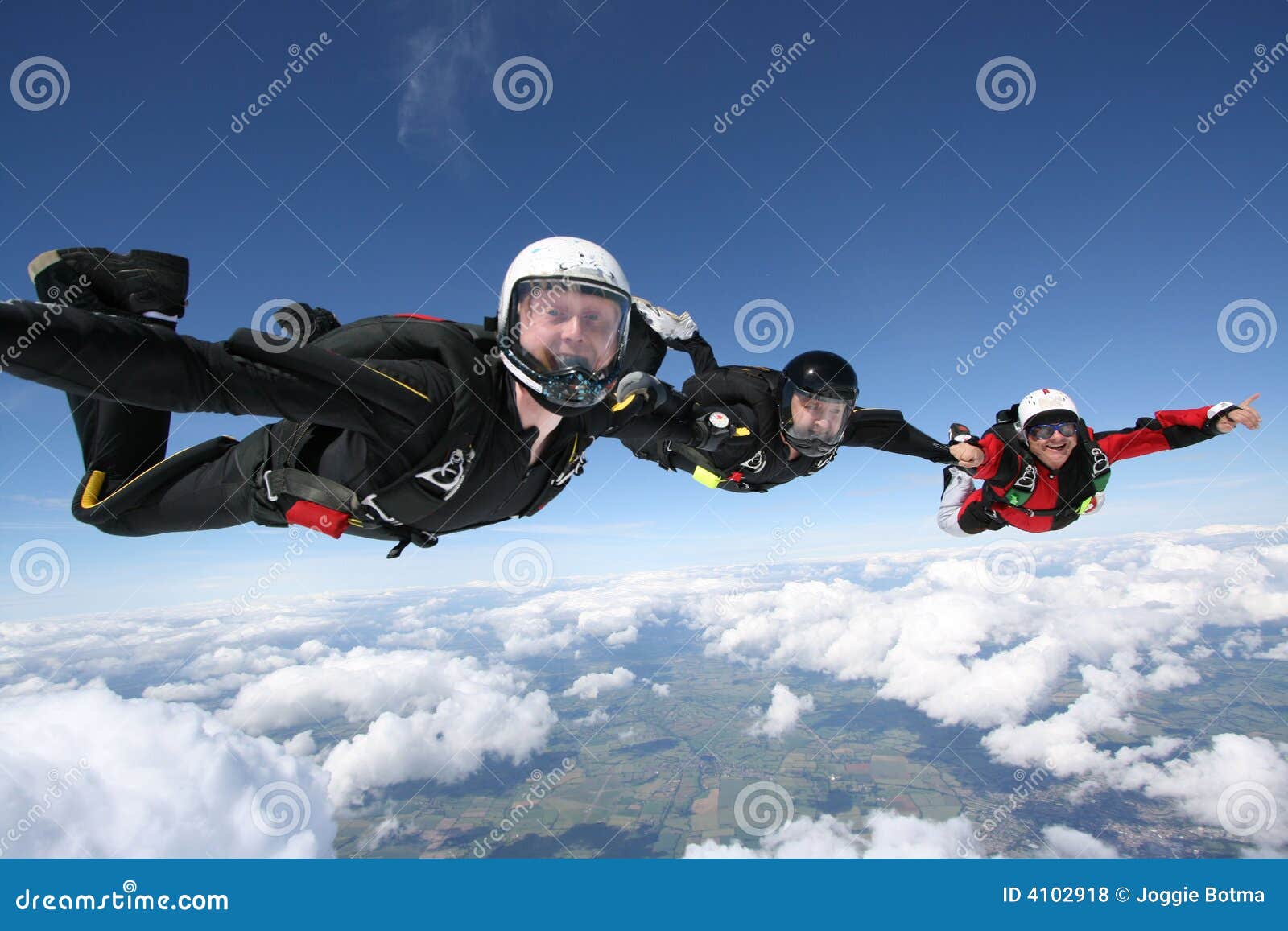 Three Skydivers Form a Line Stock Photo - Image of high, group: 4102918