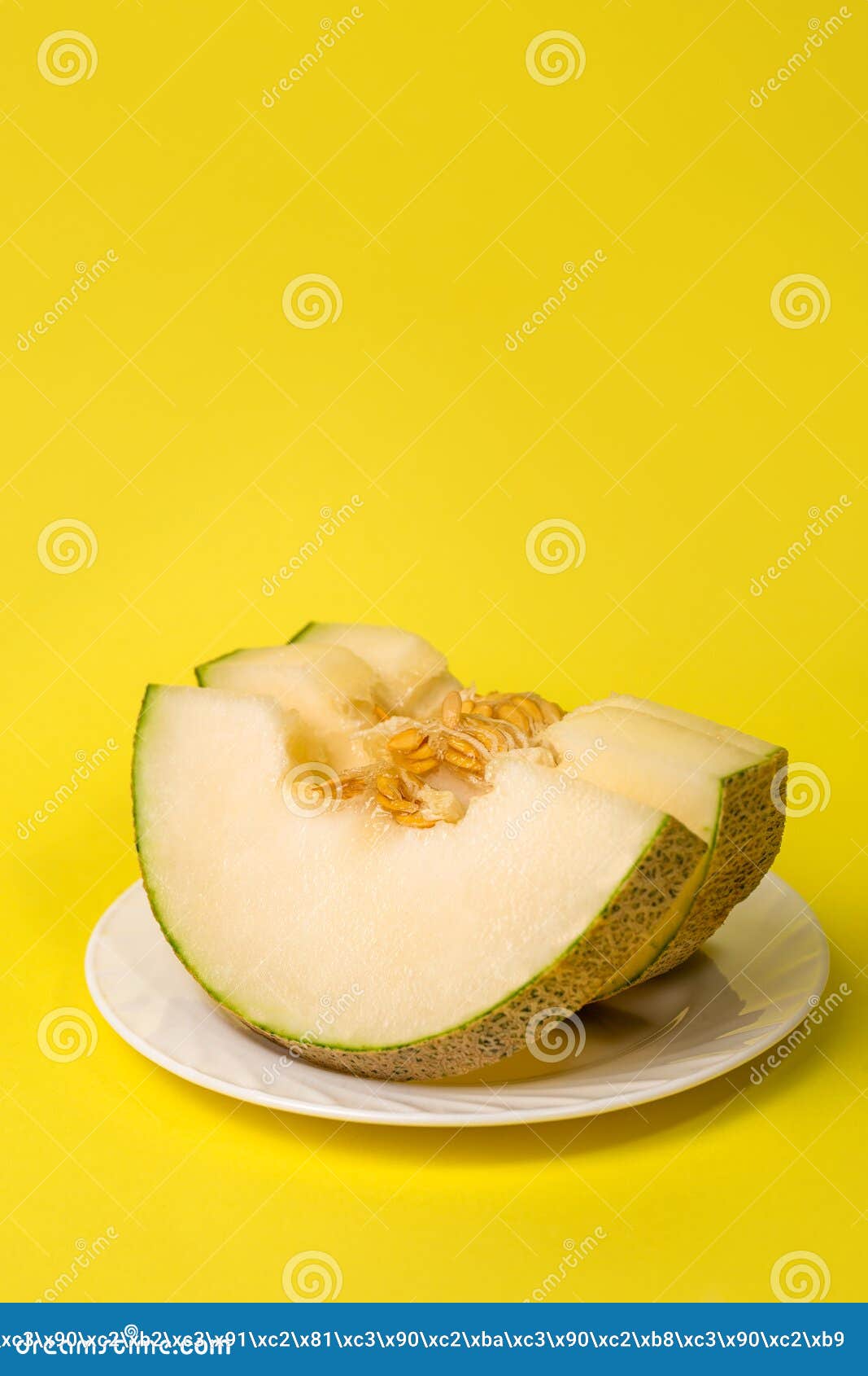 Three Slices of Melon on a Plate on a Yellow Background, Copy Space ...