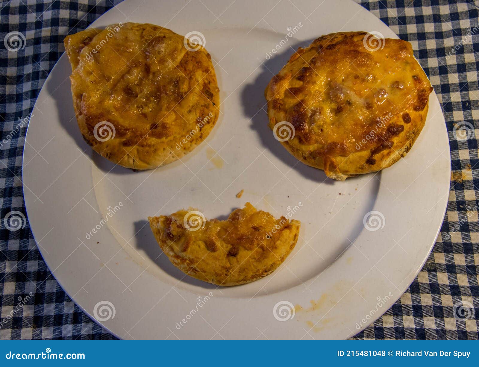 Three Small Pizzas on a Plate Stock Photo - Image of form, concept ...