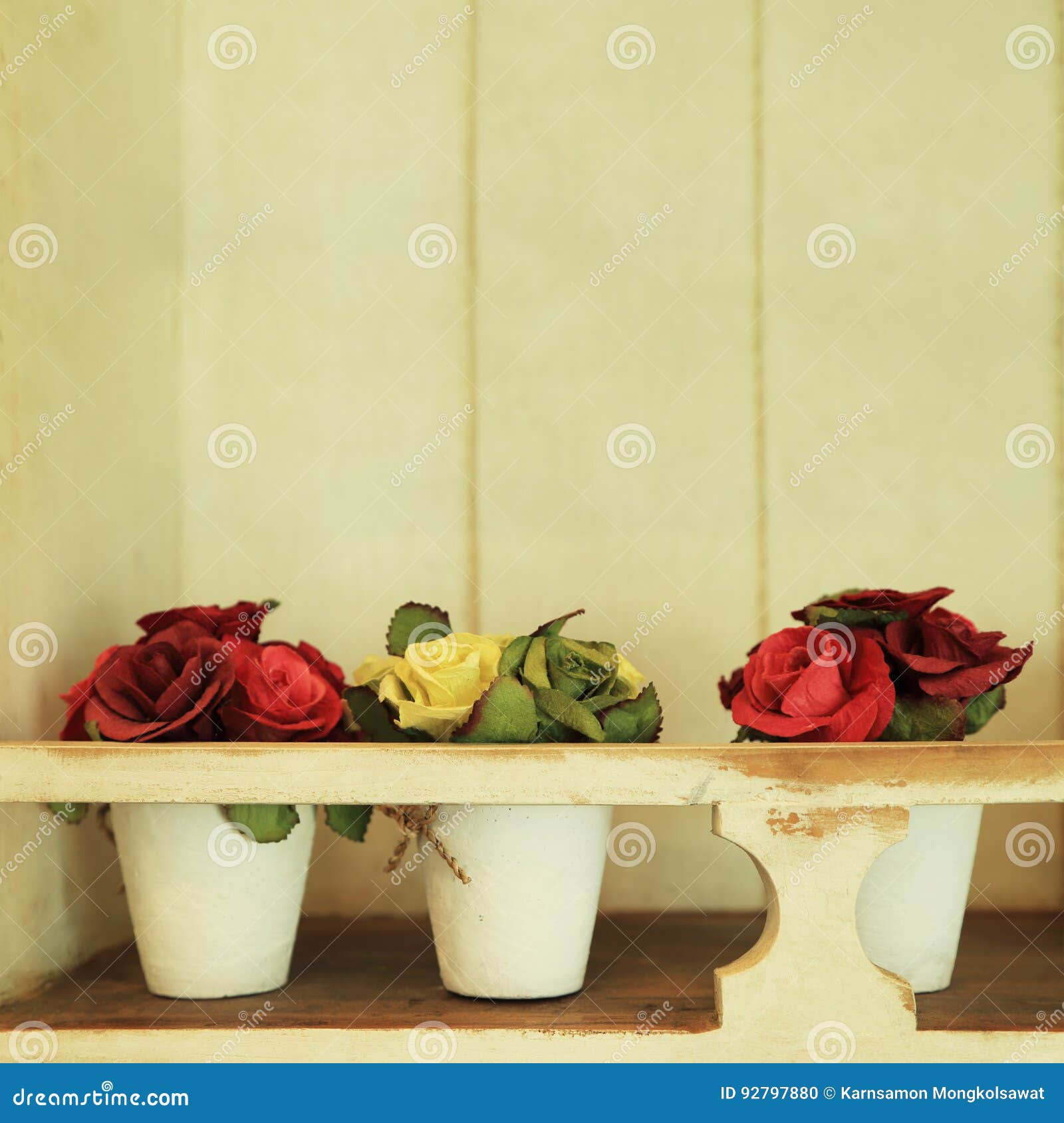 Three Small Pots with Artificial Roses in it on White Wooden Shelf ...