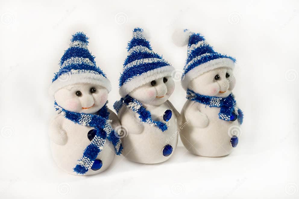 Three small snowmen stock image. Image of holiday, year - 7379885