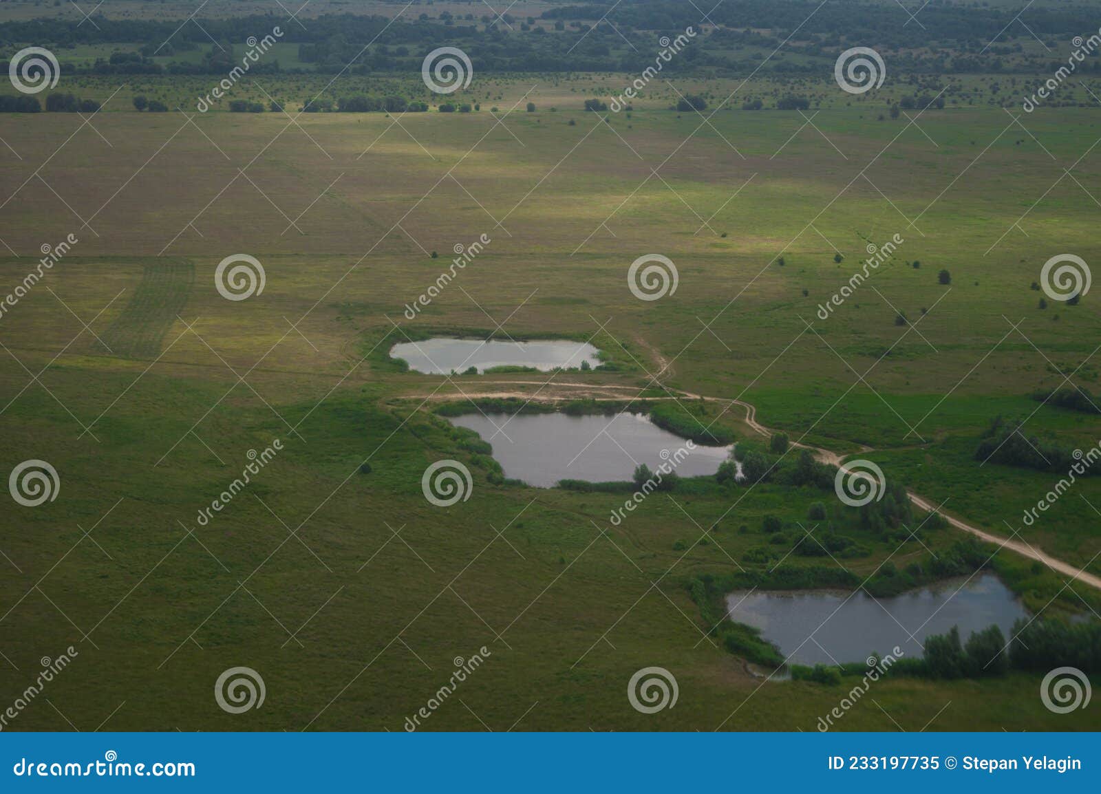 Three Small Square Lakes on the Green Field Stock Image - Image of ...