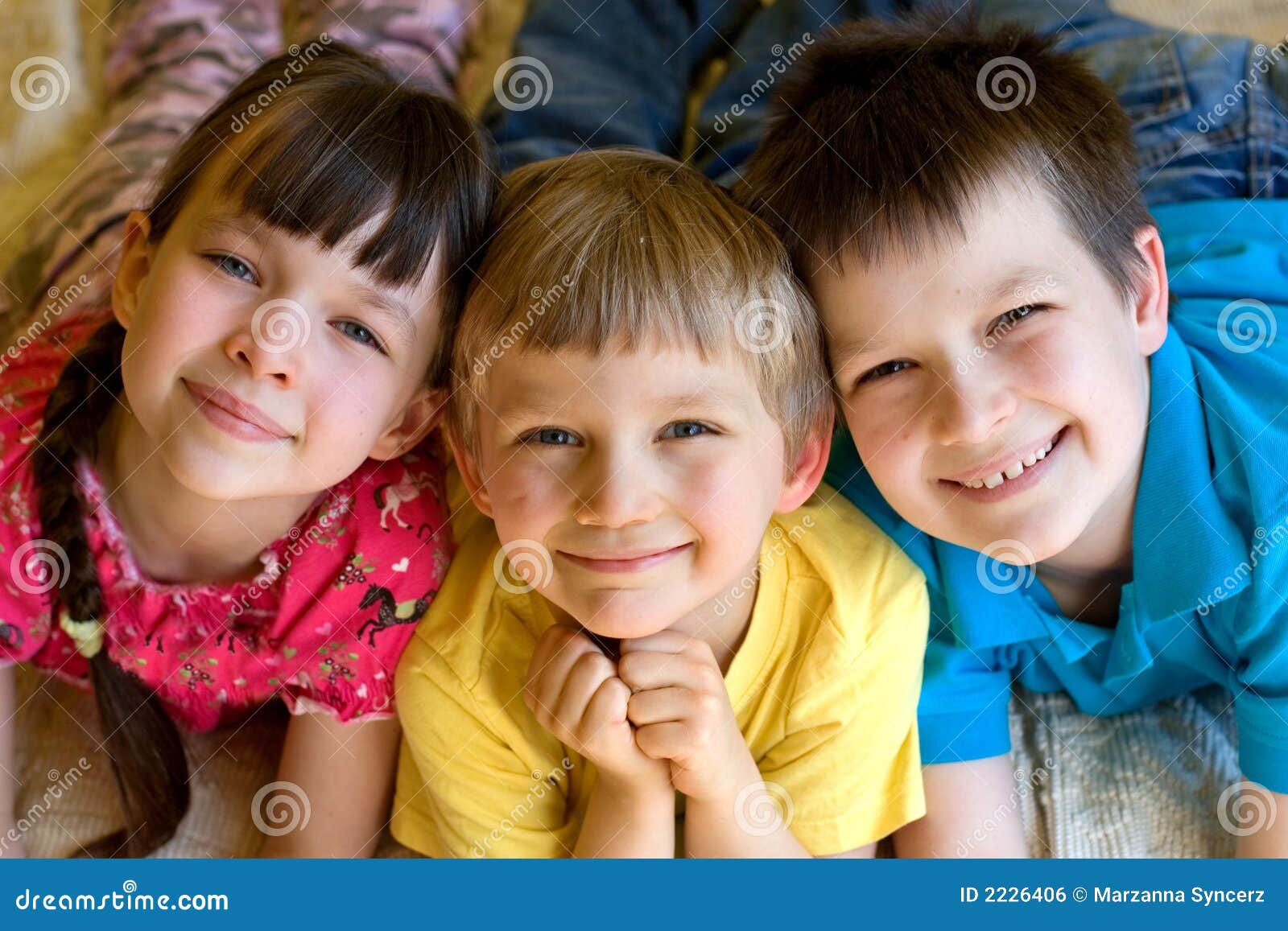 Three smiling children stock photo. Image of good, camaraderie - 2226406