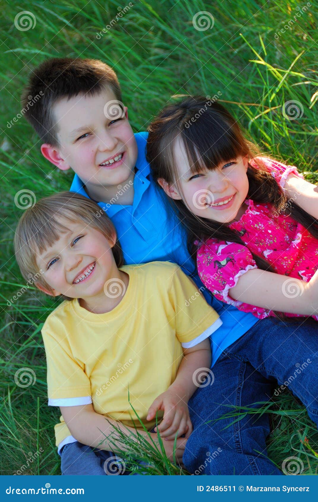 Three smiling children stock image. Image of colorful - 2486511