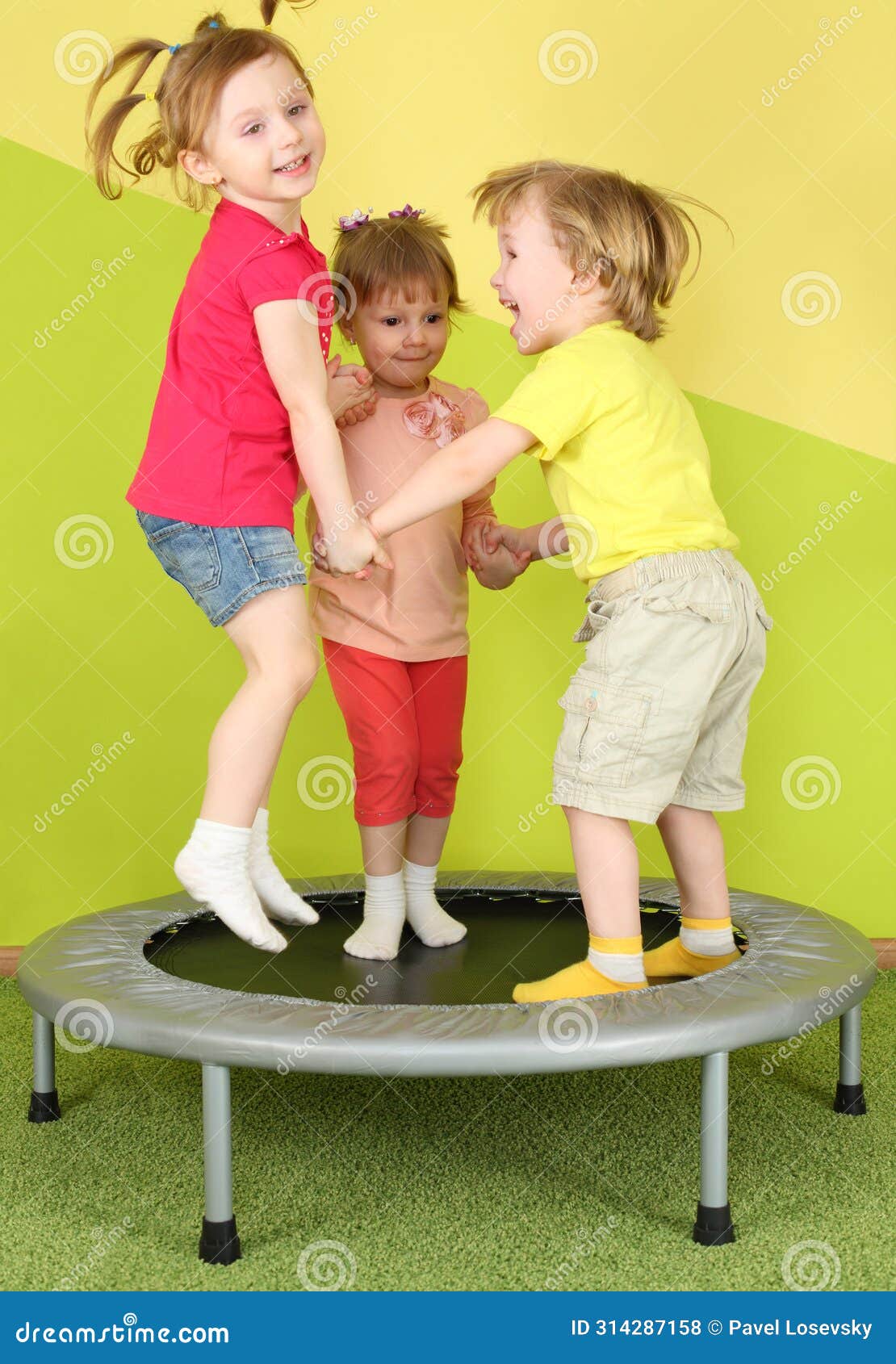Three Smiling Children Jumping on a Stock Photo - Image of childhood ...