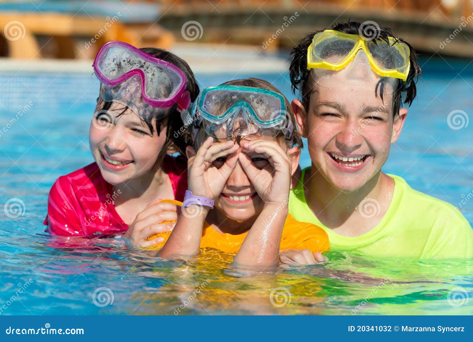 Three Smiling Children in Pool Stock Photo - Image of male, happily ...