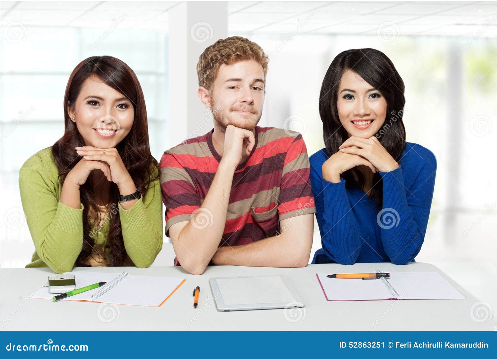 Three Smiling Students Studying Together Stock Image - Image of ...