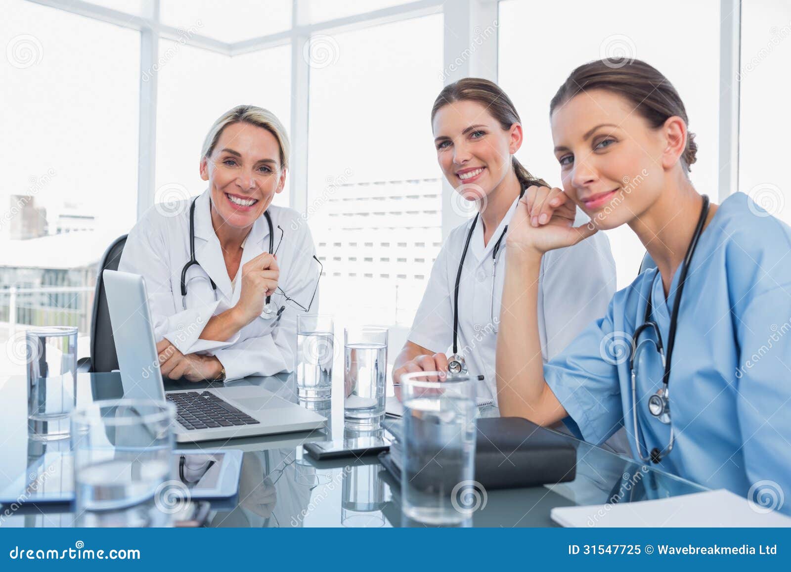 Three Smiling Women Doctors Stock Image - Image of meeting, cheerful ...