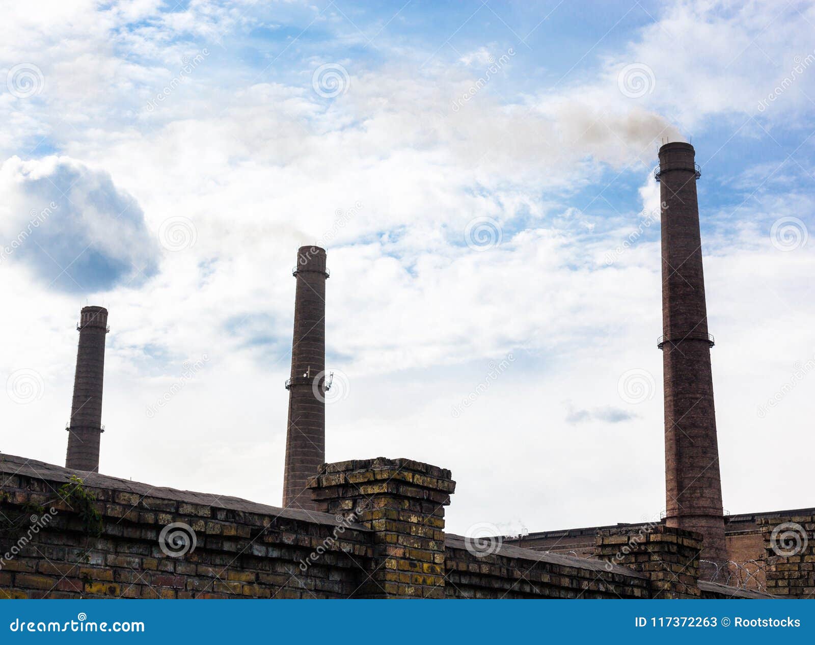 Three Smoke Stacks of the Industrial Plant Stock Image - Image of ...