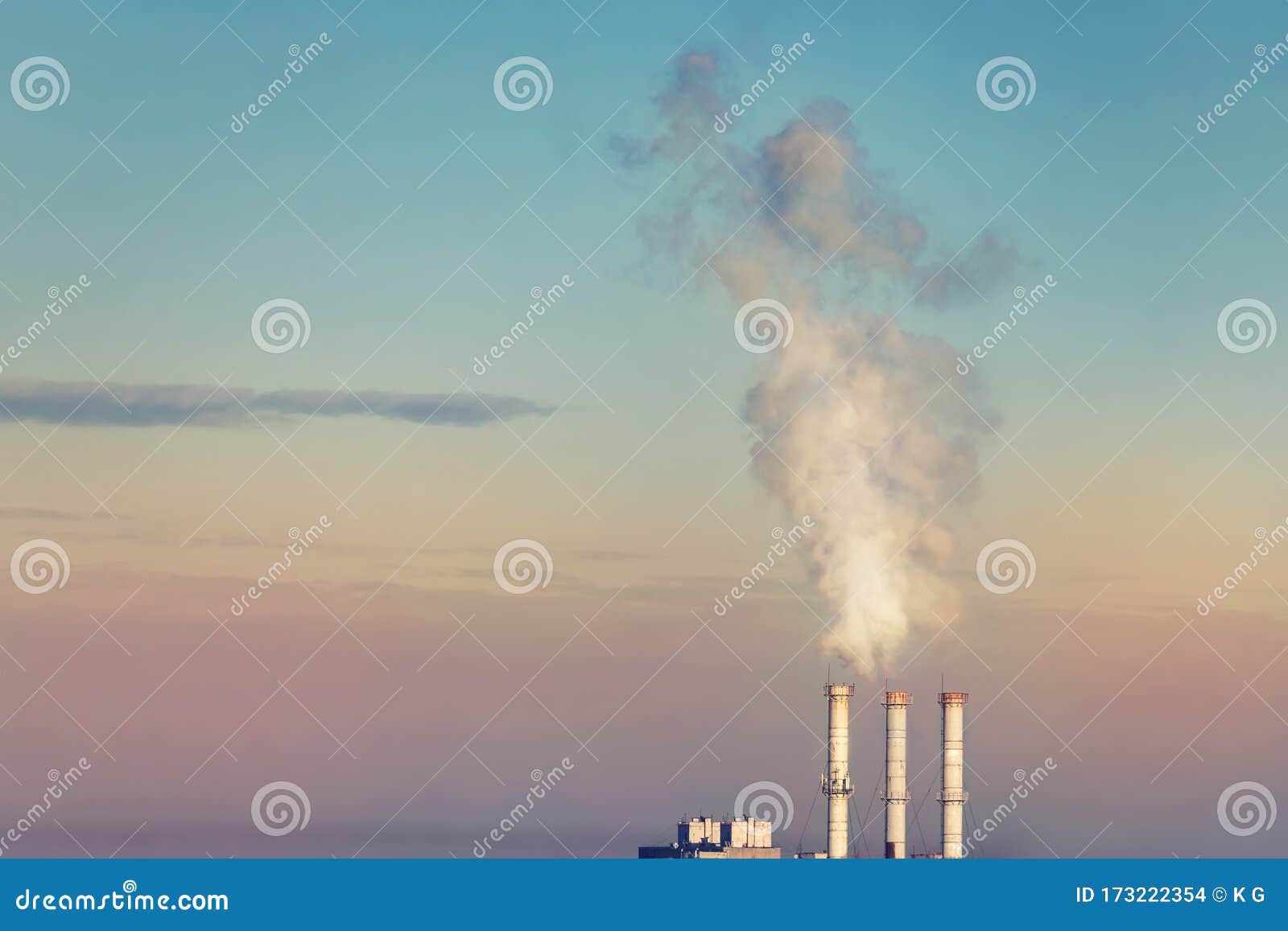 Three Smoking Stack Pipes Making Clouds Of White Smoke With Dramatic ...